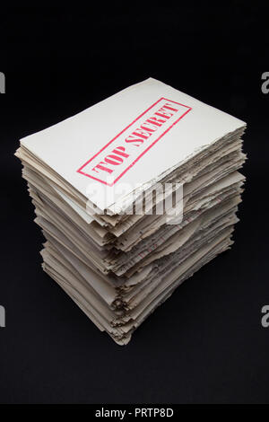 stack of secret documents on white background Stock Photo - Alamy