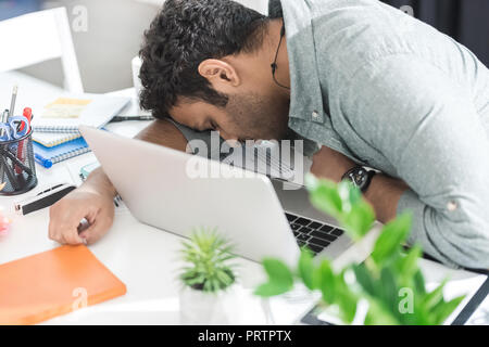 Modern computer on table near wall in light room Stock Photo - Alamy
