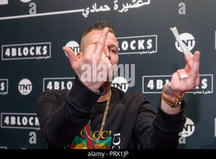 04 October 2018, Berlin: The rapper Gringo on the red carpet for the ...
