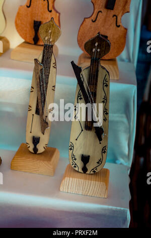 Set of models of musical instruments made of wood Stock Photo - Alamy