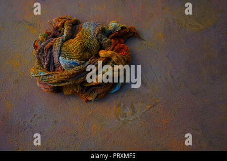 Colorful rag on oxide painted background Stock Photo - Alamy