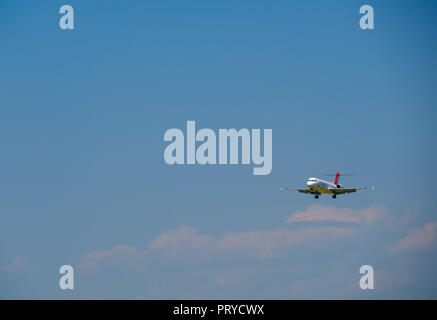 Helvetic Swiss airlines airplane preparing for landing at day time in ...