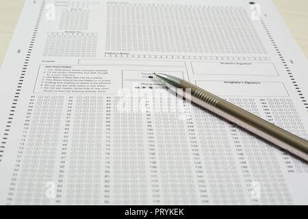 Picture of pen on the OMR sheet and OMR sheet on the clipboard Stock ...