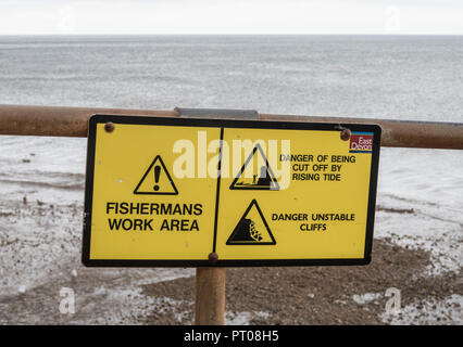 Crumbling cliffs and Danger sign for Unstable cliffs Dunwich beach and ...