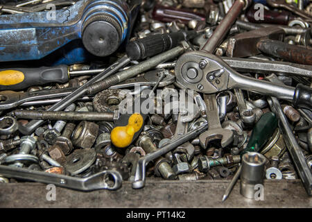 Bunch of messy tools in the garage Stock Photo - Alamy
