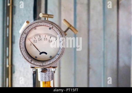 Manometer showing zero mounted on gas pipe colored yellow Stock Photo ...