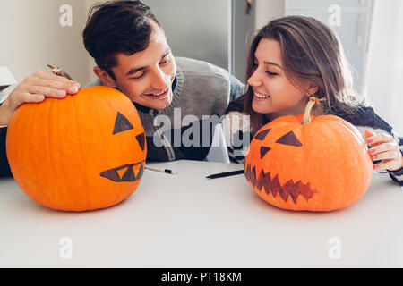 Halloween Family. Happy couple in Halloween Costume and Makeup. Bloody ...