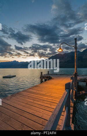 The jetty with lamp post at dusk, Glenorchy, Queenstown Lake district ...