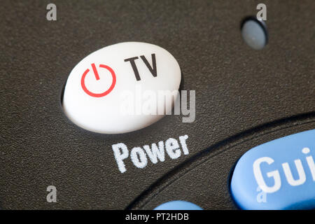 close up of television remote control selective focus on power button ...