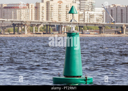 Green navigational buoy marker in a river Stock Photo - Alamy