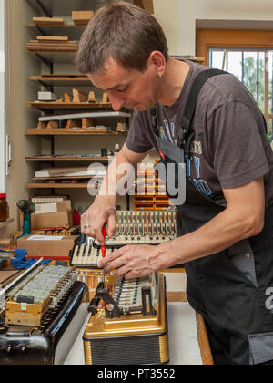 music instrument repair shop in Holland Stock Photo - Alamy