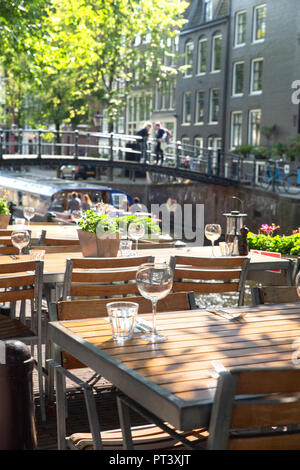 Street cafe, table set in a restaurant outdoor, romantic meal, elegant ...
