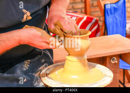 Hands of potter man making a jar Stock Photo - Alamy