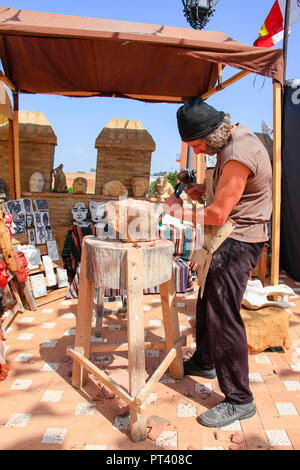 Artisan stonecutter with ancient tools of an ancient artisan ...