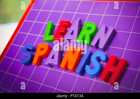 learn spanish language alphabet on magnets letters Stock Photo - Alamy