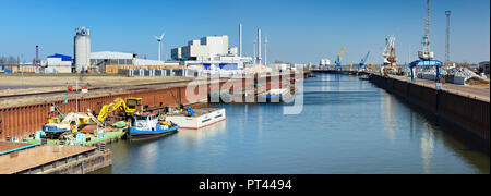 Freighter at the harbour canal, inland port Duisburg-Ruhrort, cargo ...