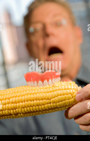 Senior man loses dentures eating corn on the cob, USA Stock Photo - Alamy