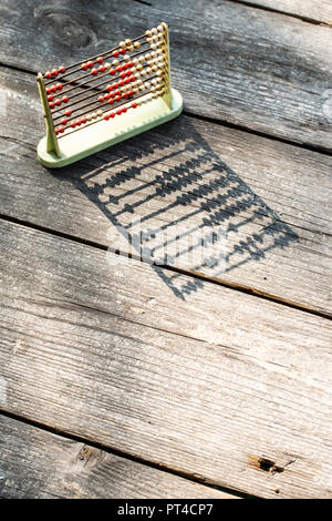 Vintage abacus. Backlight Stock Photo - Alamy