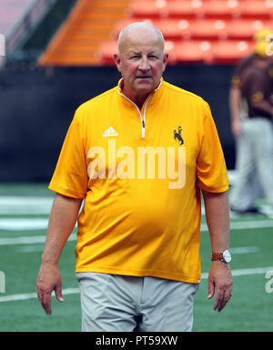 Wyoming coach Craig Bohl watches from the sideline during the second ...