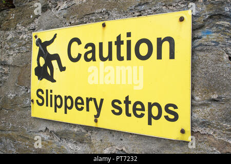 Slippery steps warning sign at Newquay harbour. Metaphor risk analysis ...