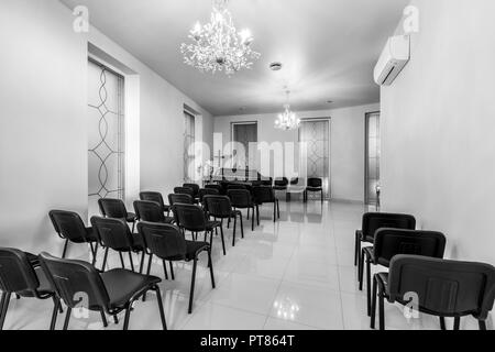 Black and white interior of the funeral home with coffin Stock Photo ...