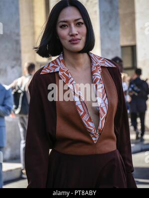 Fashion bloggers street style outfits after Emporio Armani fashion show ...