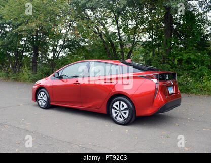 toyota prius hybrid car red Stock Photo - Alamy