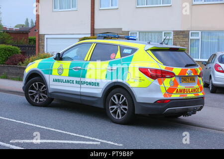 Emergency service vehicles at the scene of a fatal house fire in ...