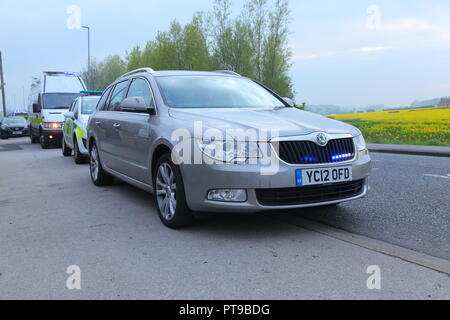 Emergency service vehicles at the scene of a fatal house fire in ...