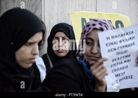 Athens, Greece. 8th October, 2018. Protesters hold banner outside of ...