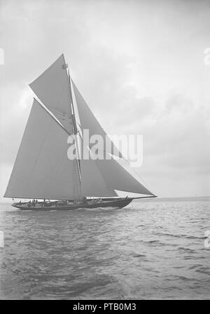 The 221 ton gaff-rigged cutter 'Britannia' sailing under spinnaker ...