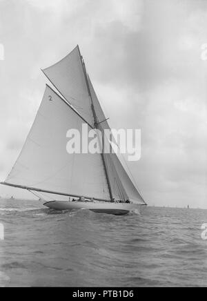 The 40-rater cutter 'Carina' sailing close-hauled, 1913. Creator: Kirk ...