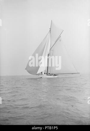 The 40-rater cutter 'Carina' sailing full sail downwind, 1913. Creator ...