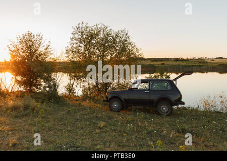 DNIPROPETROVSK REGION, UKRAINE - JUNE 19, 2017: Vaz Niva blue-green ...