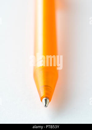 Close up of an orange ballpoint pen Stock Photo - Alamy