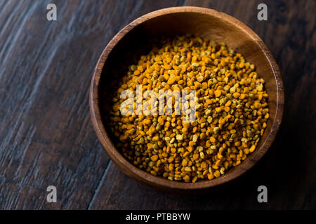 Bee Pollen Seeds in Wooden Bowl / Polen. Organic Product Stock Photo ...