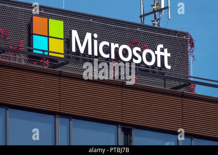 Microsoft sign and logo on the facade of corporation campus in Silicon ...