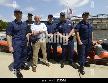 Members of Coast Guard Sector Delaware Bay pose with Jon Dorenbos, a ...