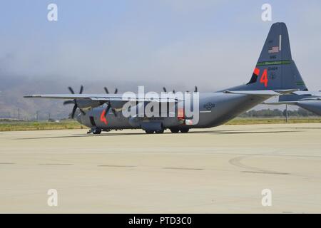 MAFFS (Modular Airborne Fire Fighting System) ground crew members ...
