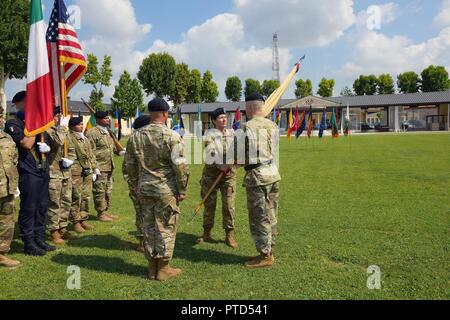 Brig. Gen. Christine A. Beeler passes the colors to Col. Justin L ...