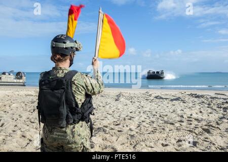 U.S. Marines approach the USN training boat USNS Hunter during search ...
