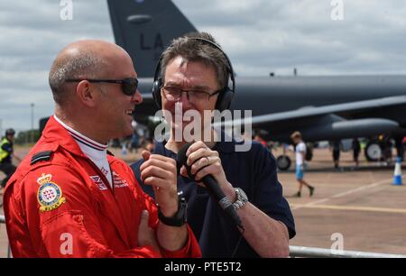 Mike Ling RAF Red Arrows commentator commentating at an airshow. Red 10 ...