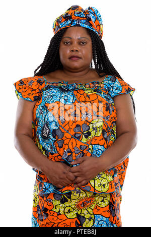 Portrait of an african woman standing isolated over white background ...