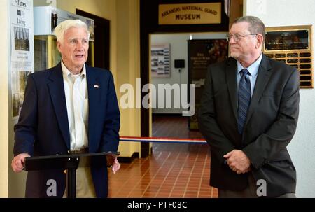 Col. (ret) John Fordyce III (center right) speaks with Col. Damon Damon ...
