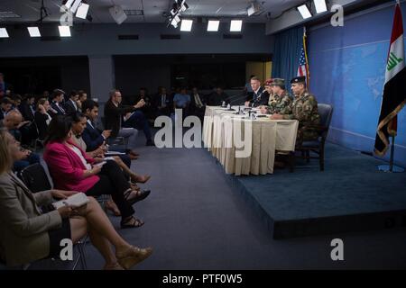 Operation Inherent Resolve spokesman U.S. Army Col. Ryan Dillon and ...