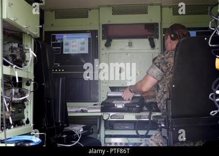 Staff Sgt. Melody Battaglia works inside the AN/TPS-31A V7 Air Traffic ...
