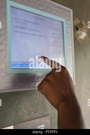 A Laundry Advanced System (LADS) is programed by the U.S. Army Reserve ...