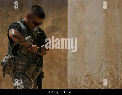 A U.S. military police officer with the 382nd Military Police ...