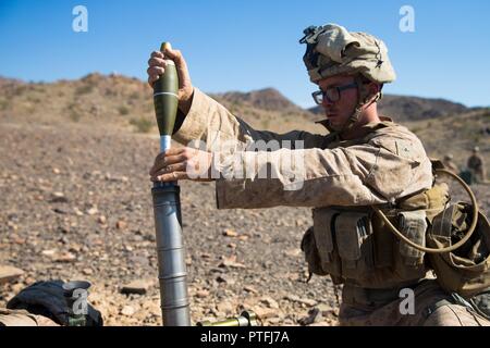 U.S. Marine Corps mortarman with Alpha Company, 1st Battalion, 1st ...