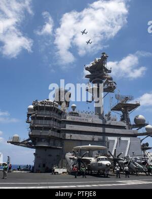 US Navy Two C-2A Greyhounds stand by in preparation for launch at the ...